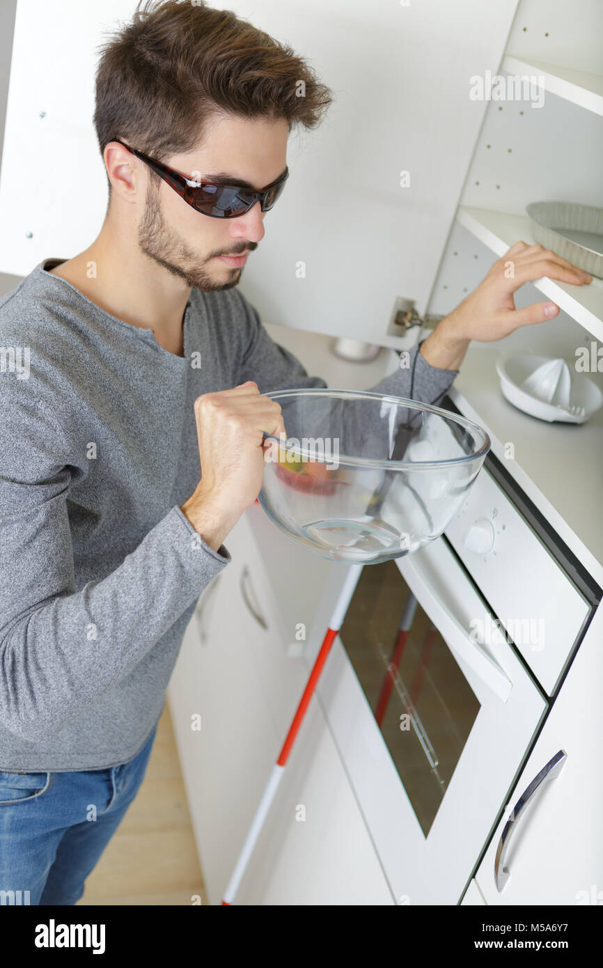 blind man in his kitchen Stock Photo - Alamy