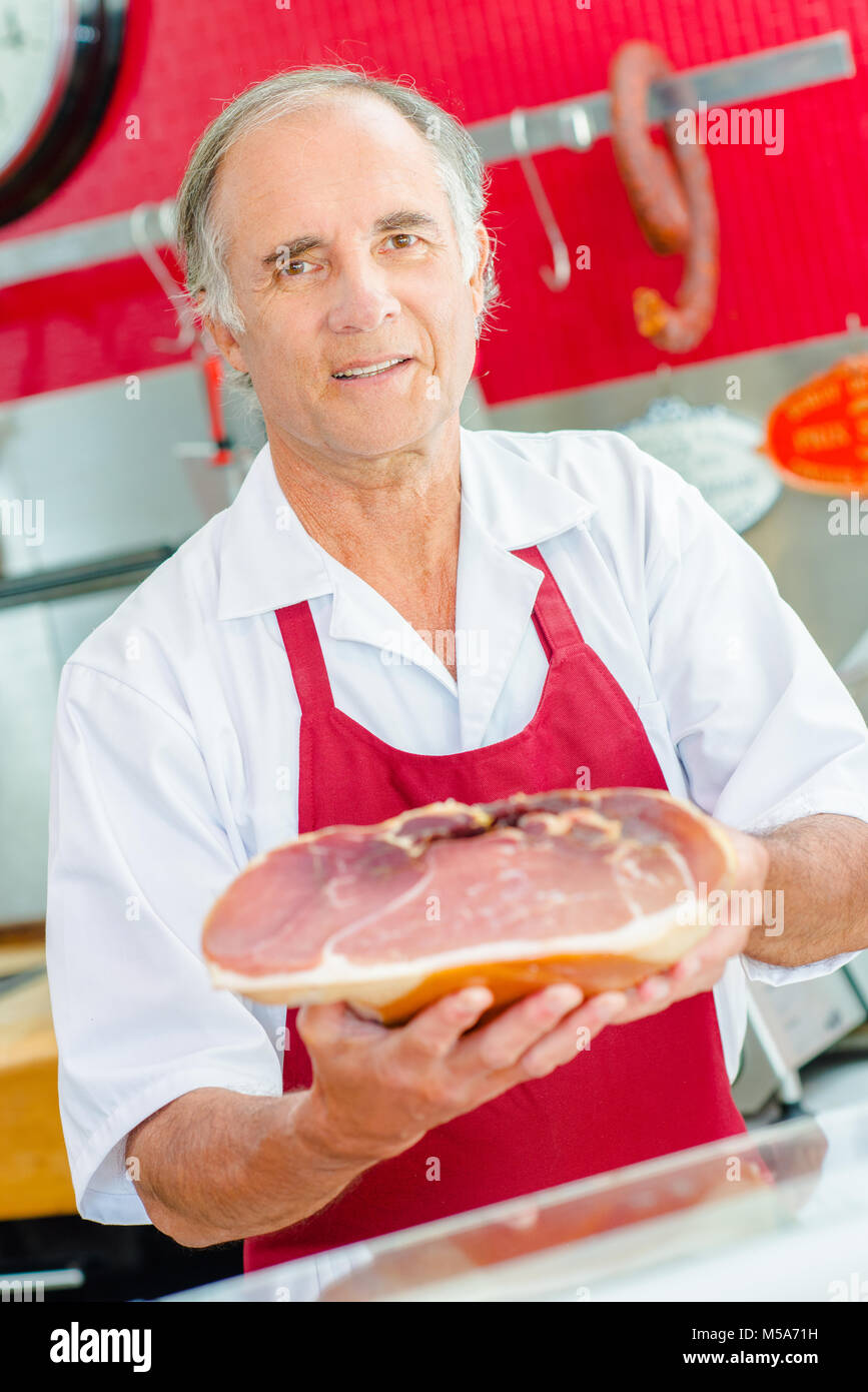 butcher and his meat Stock Photo - Alamy