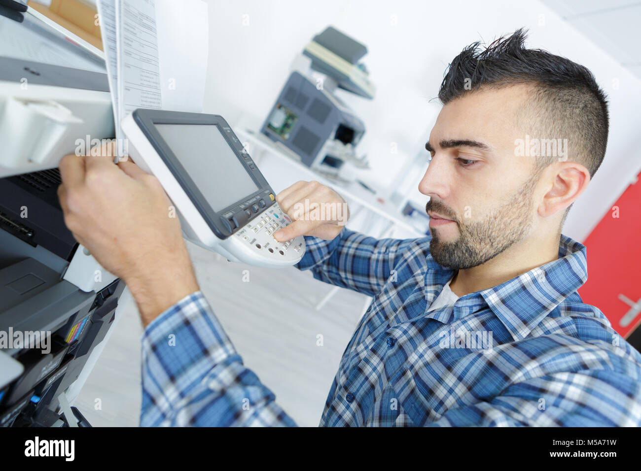 fixing a printer Stock Photo - Alamy