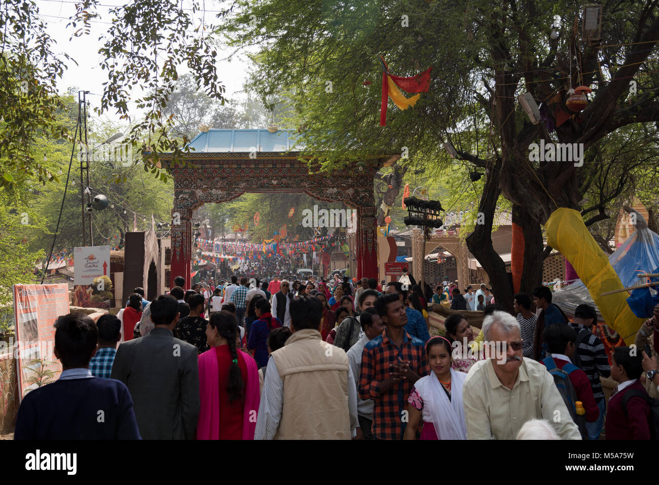 A group of people walking in a mela Stock Photo - Alamy