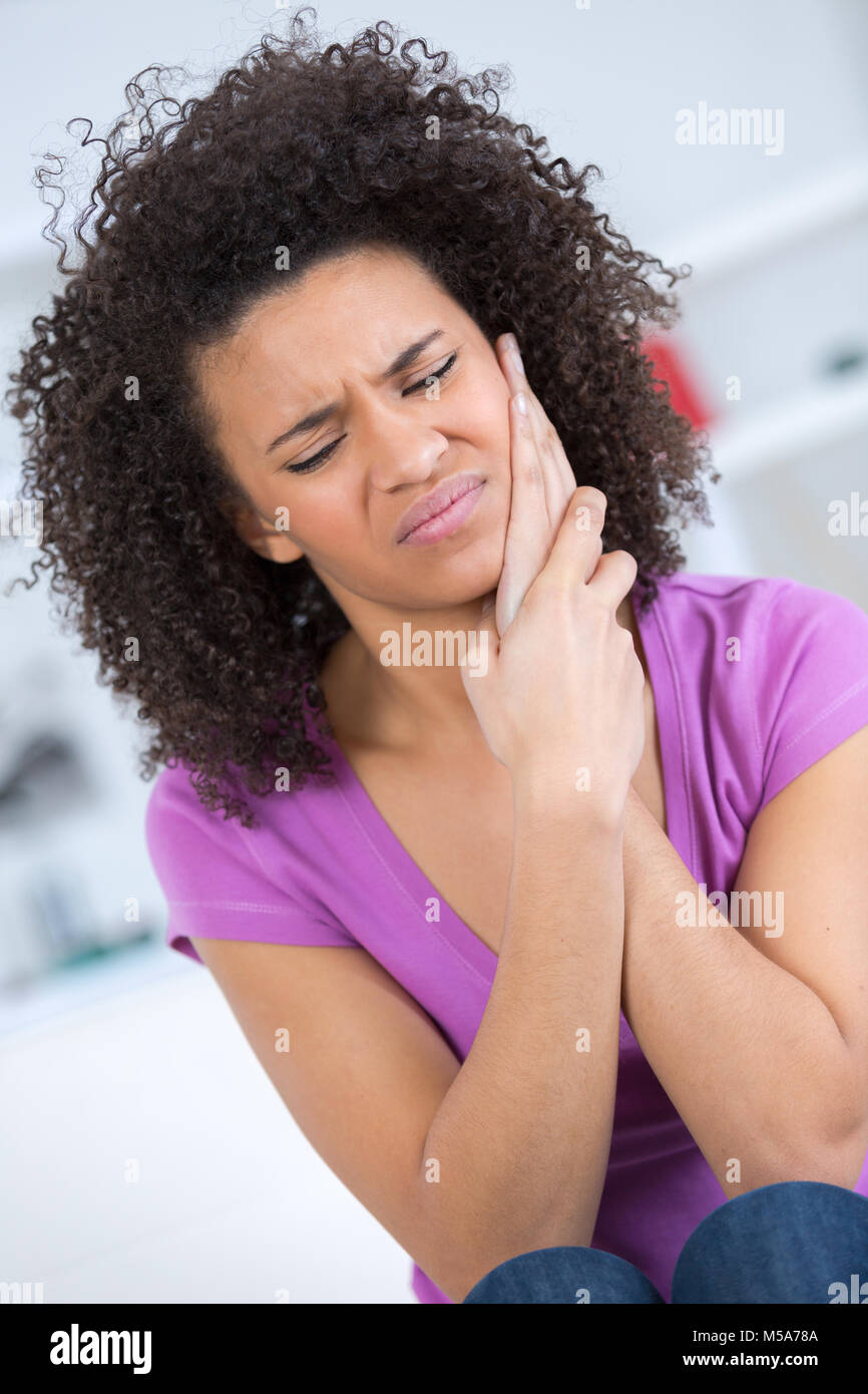 Young lady suffering with toothache Stock Photo - Alamy