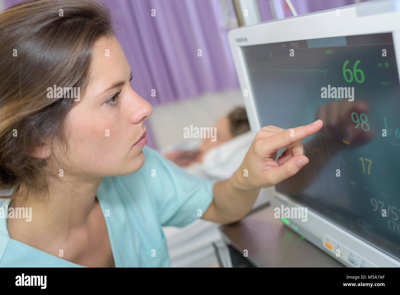 nurse using a screen Stock Photo - Alamy