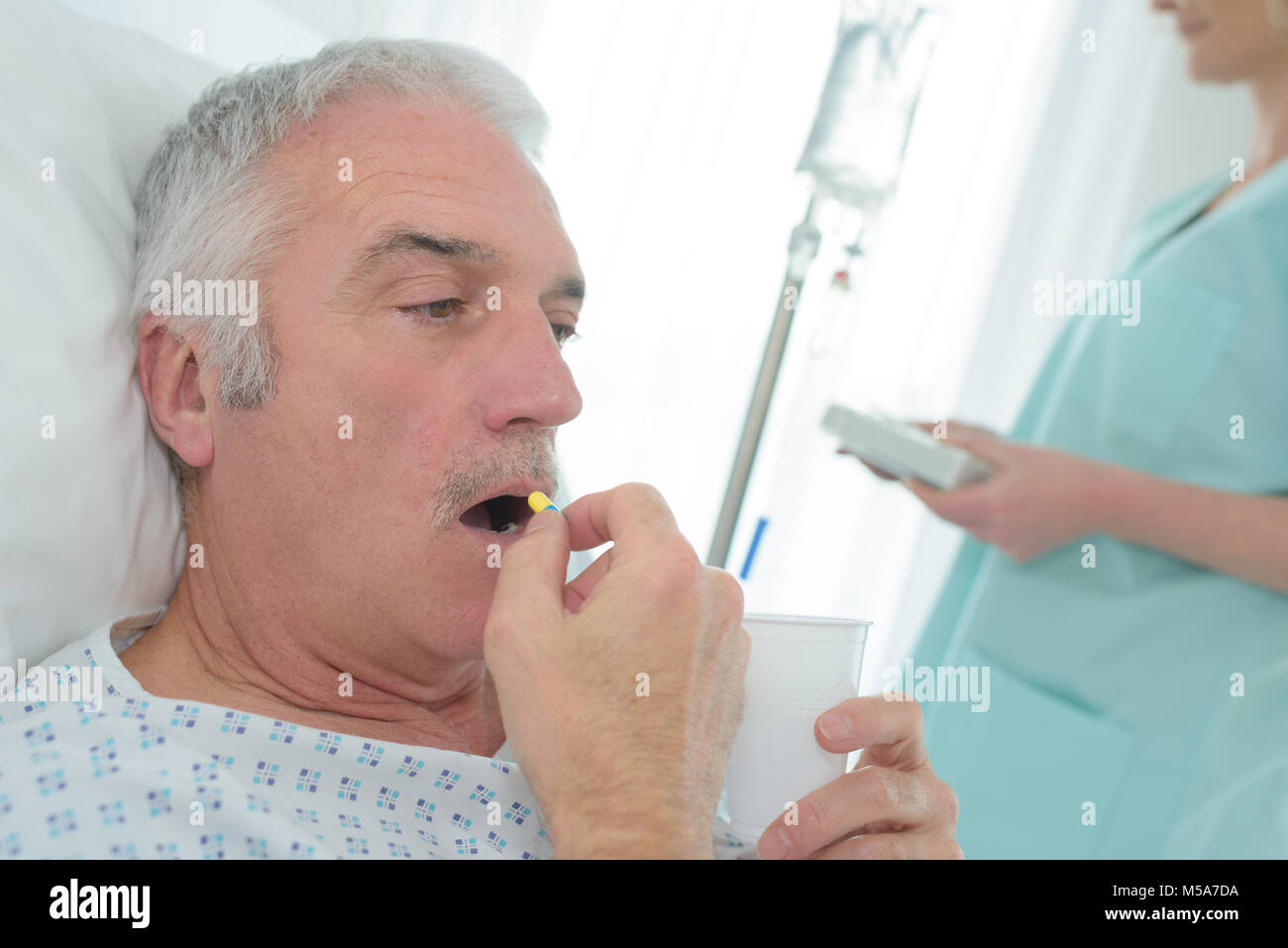 Doctor patient girl pill hi-res stock photography and images - Alamy