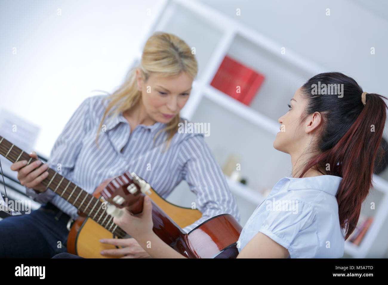 Guitar instructor hi-res stock photography and images - Alamy