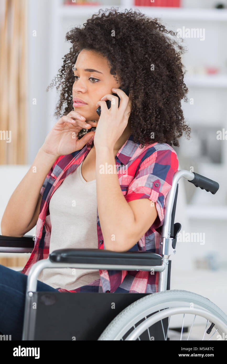 beautiful disabled woman is calling Stock Photo - Alamy