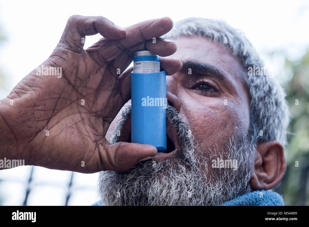Man inhaler asthma with disease hi-res stock photography and images - Alamy