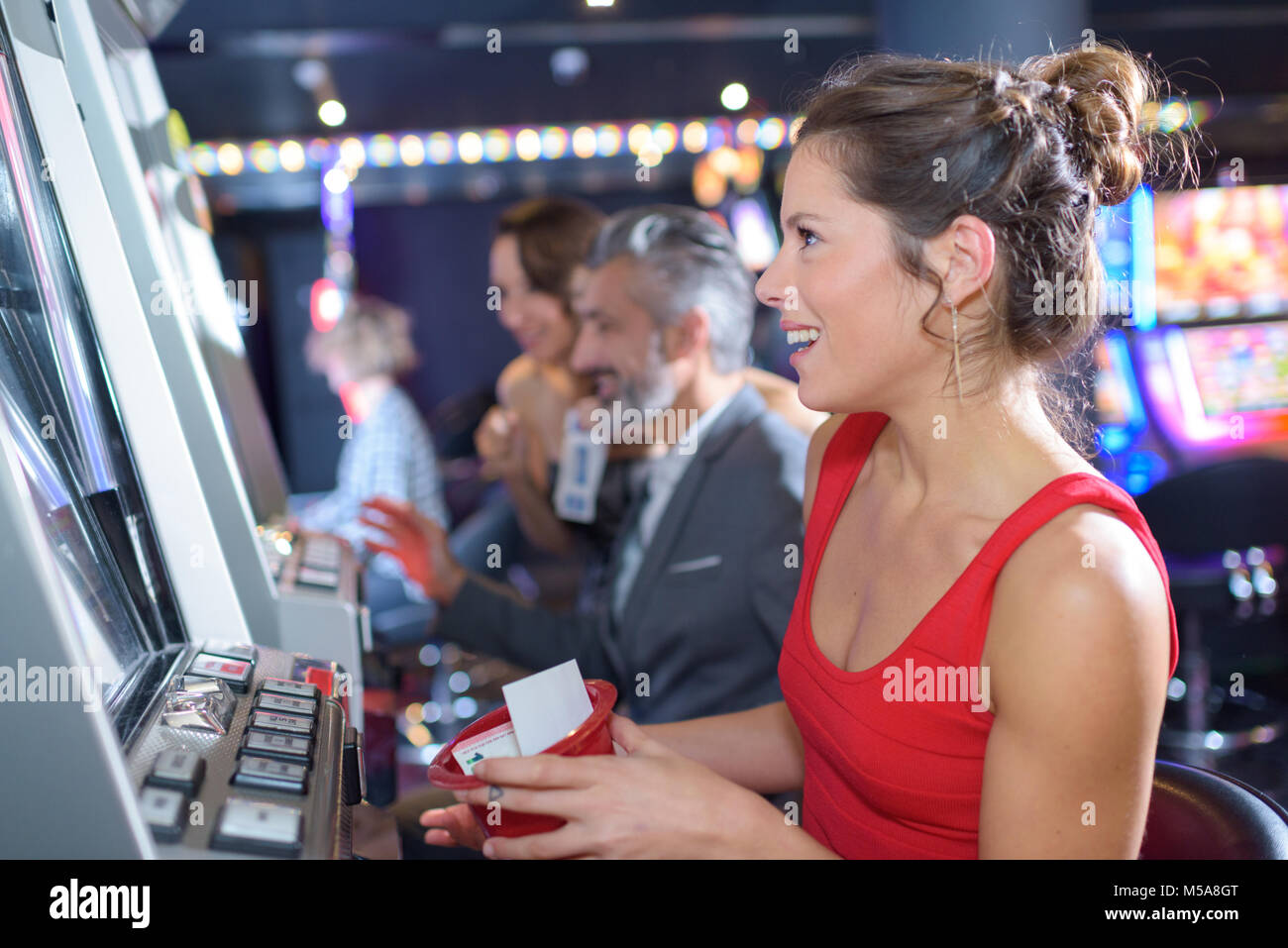 Slot machine gamble girl hi-res stock photography and images - Alamy