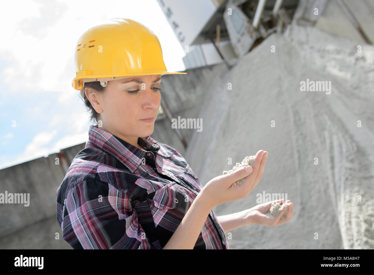 female builder working outdoors Stock Photo - Alamy