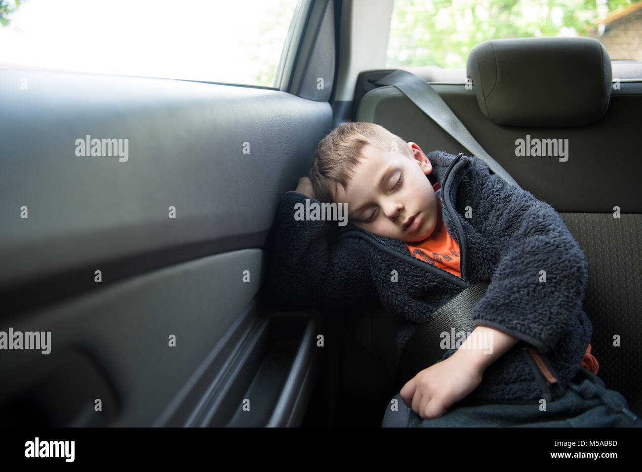 Kid Sleeping On Road High Resolution Stock Photography and Images - Alamy