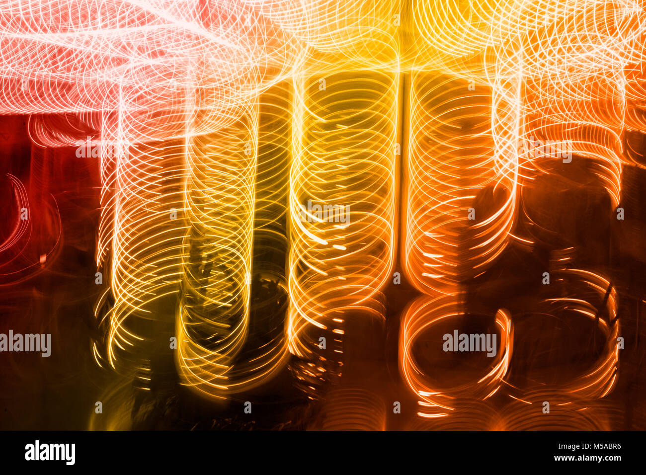 Abstract fairground lights: a roundabout in the Piazza della Repubblica ...