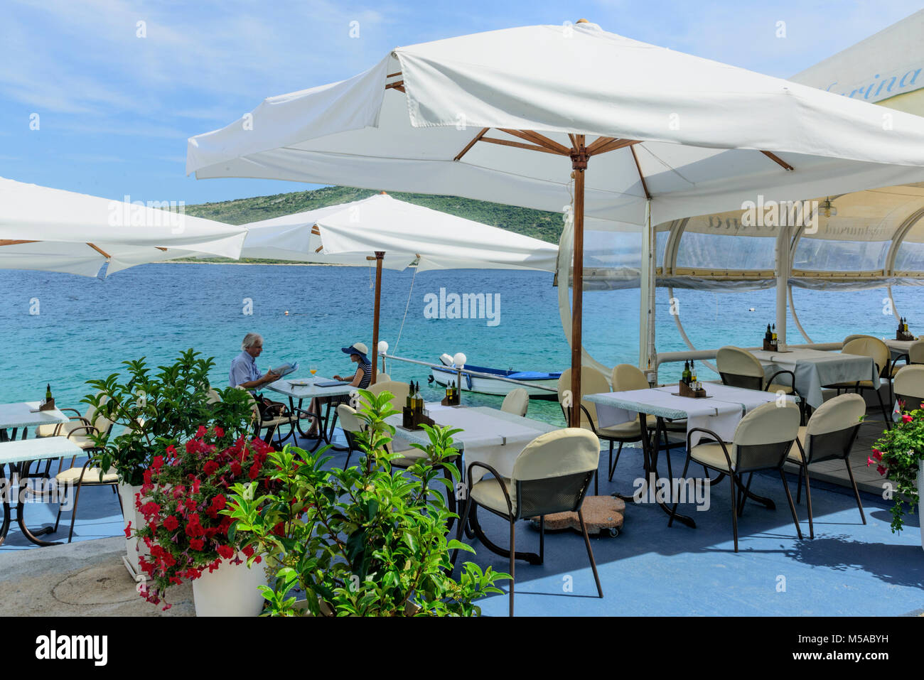 Europe, Balkan, Croatia, Primosten, cafe on the waterfront Stock Photo ...