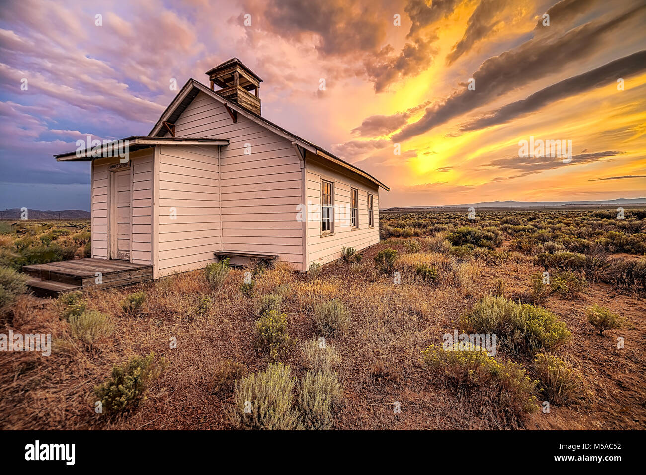 USA, Fort Rock Historic Sunset School House At Sunset, Central Oregon ...