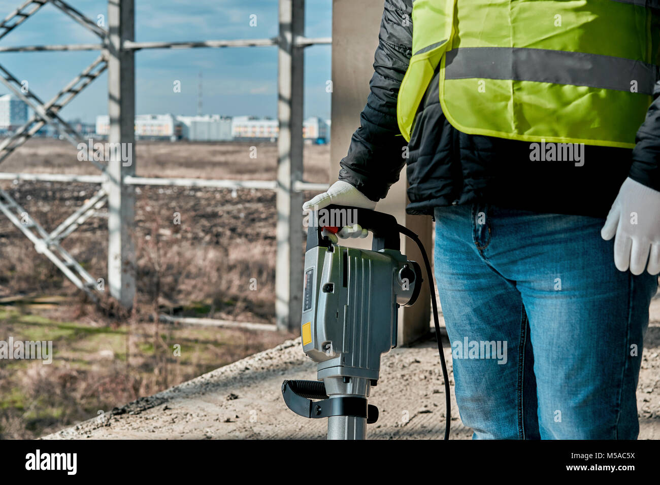 Man using a jackhammer hi-res stock photography and images - Alamy