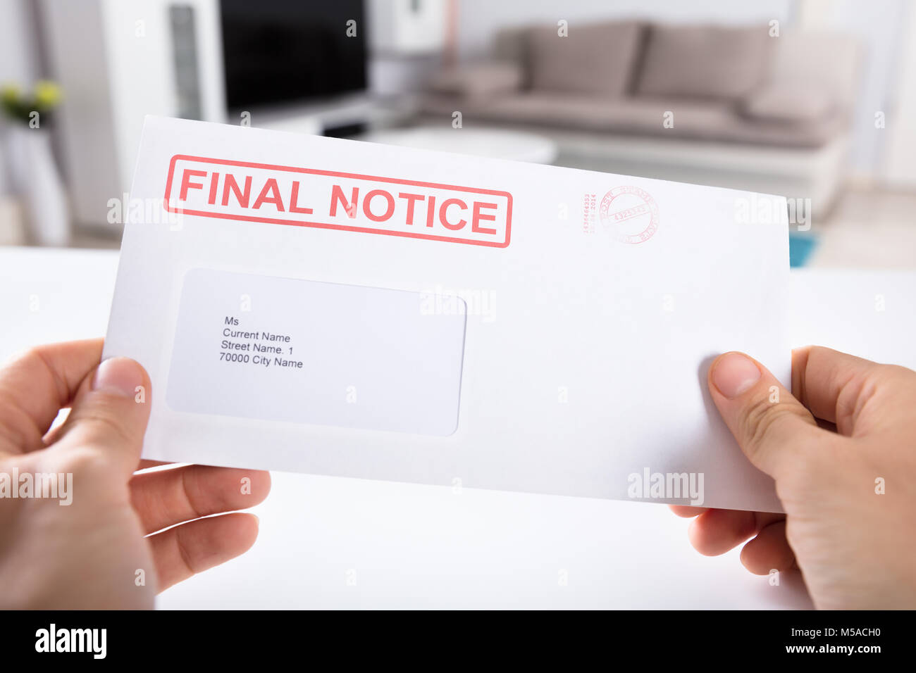 Holding up envelope hi-res stock photography and images - Alamy