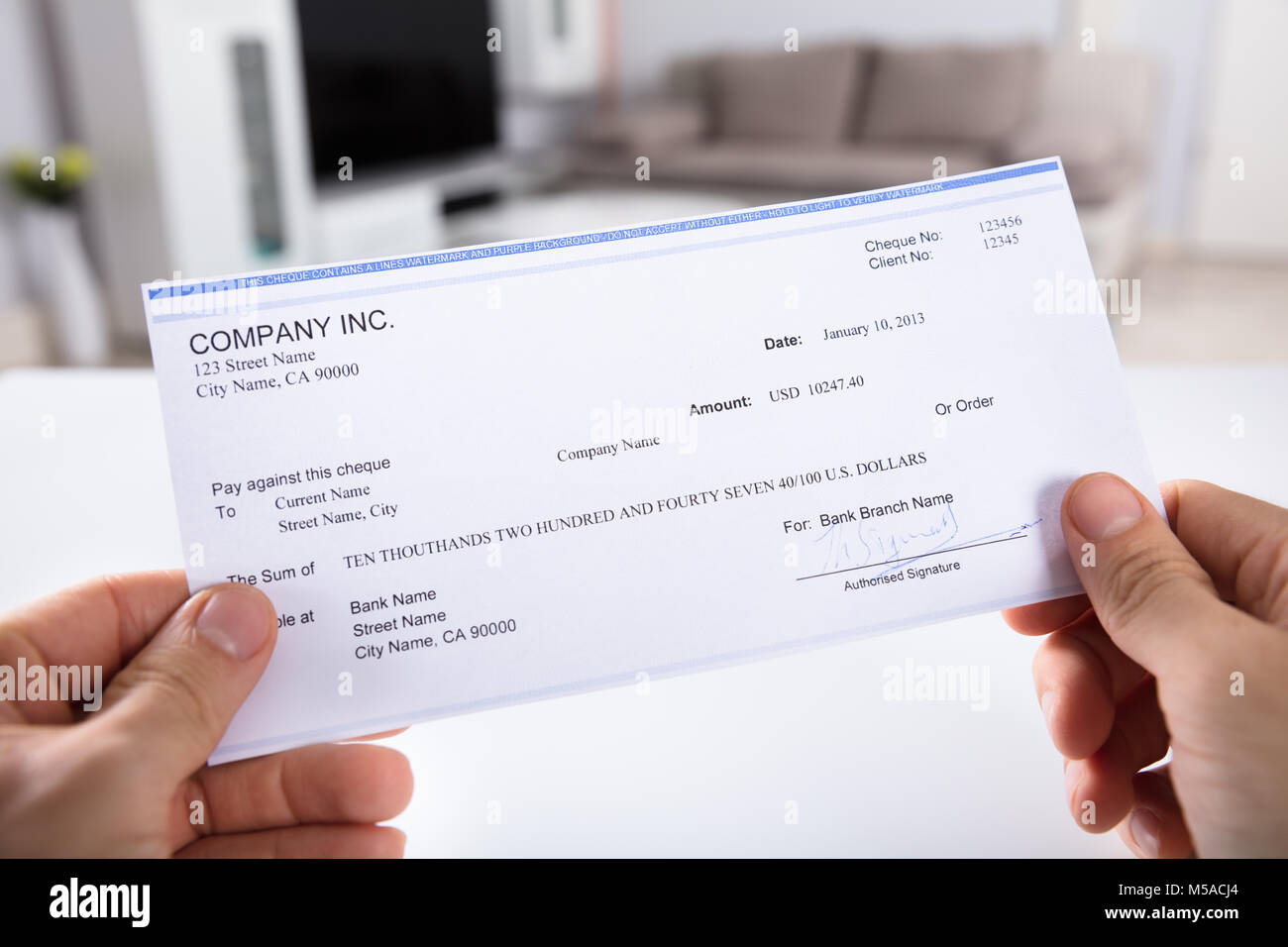 First cheque hi-res stock photography and images - Alamy