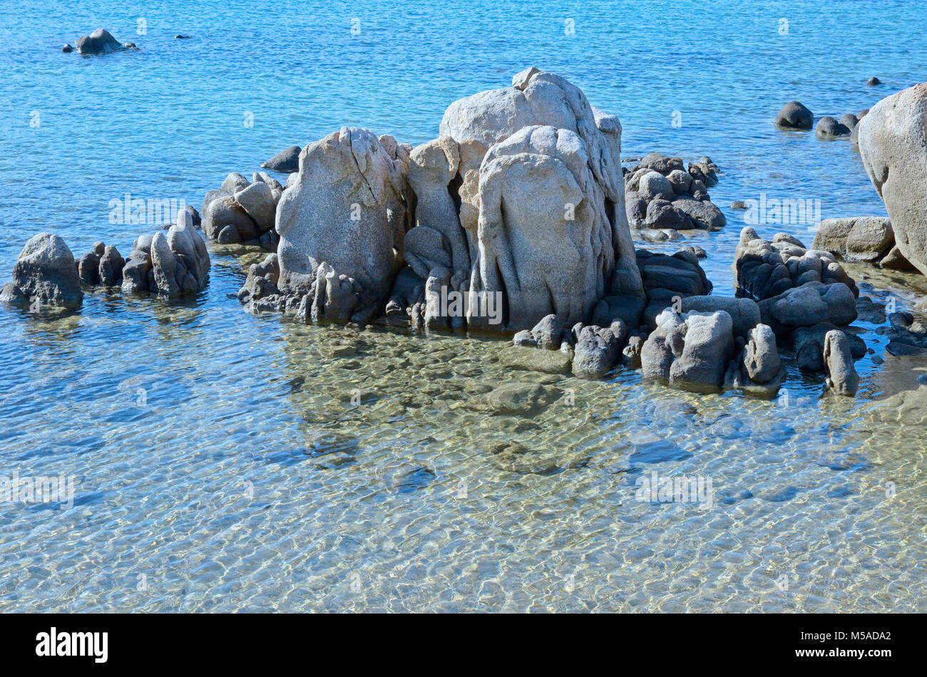 Sardinia, Italy: rocks and sea at Beach Stock Photo - Alamy