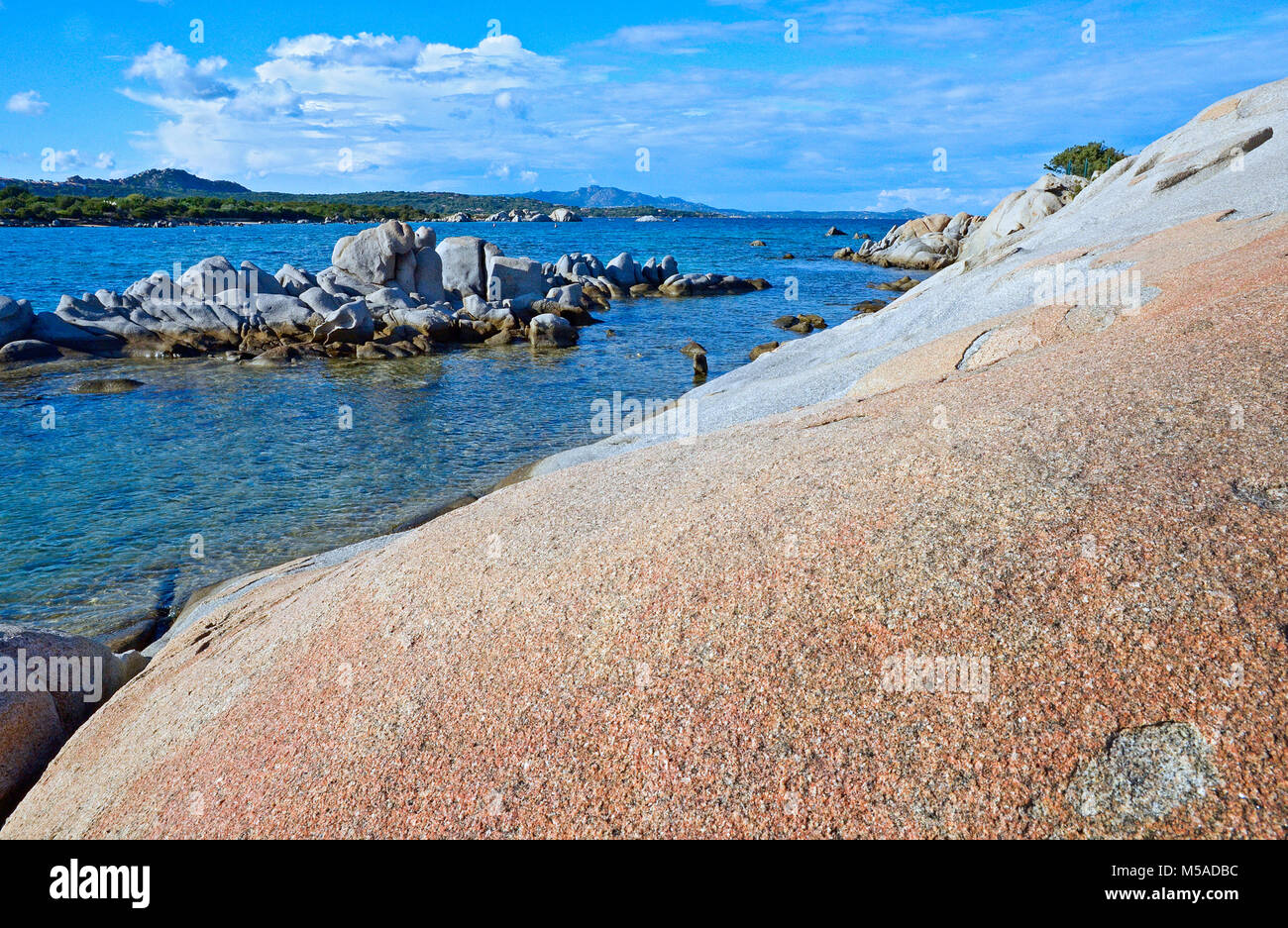 Sardinia, Italy: rocks and sea at Beach Stock Photo - Alamy