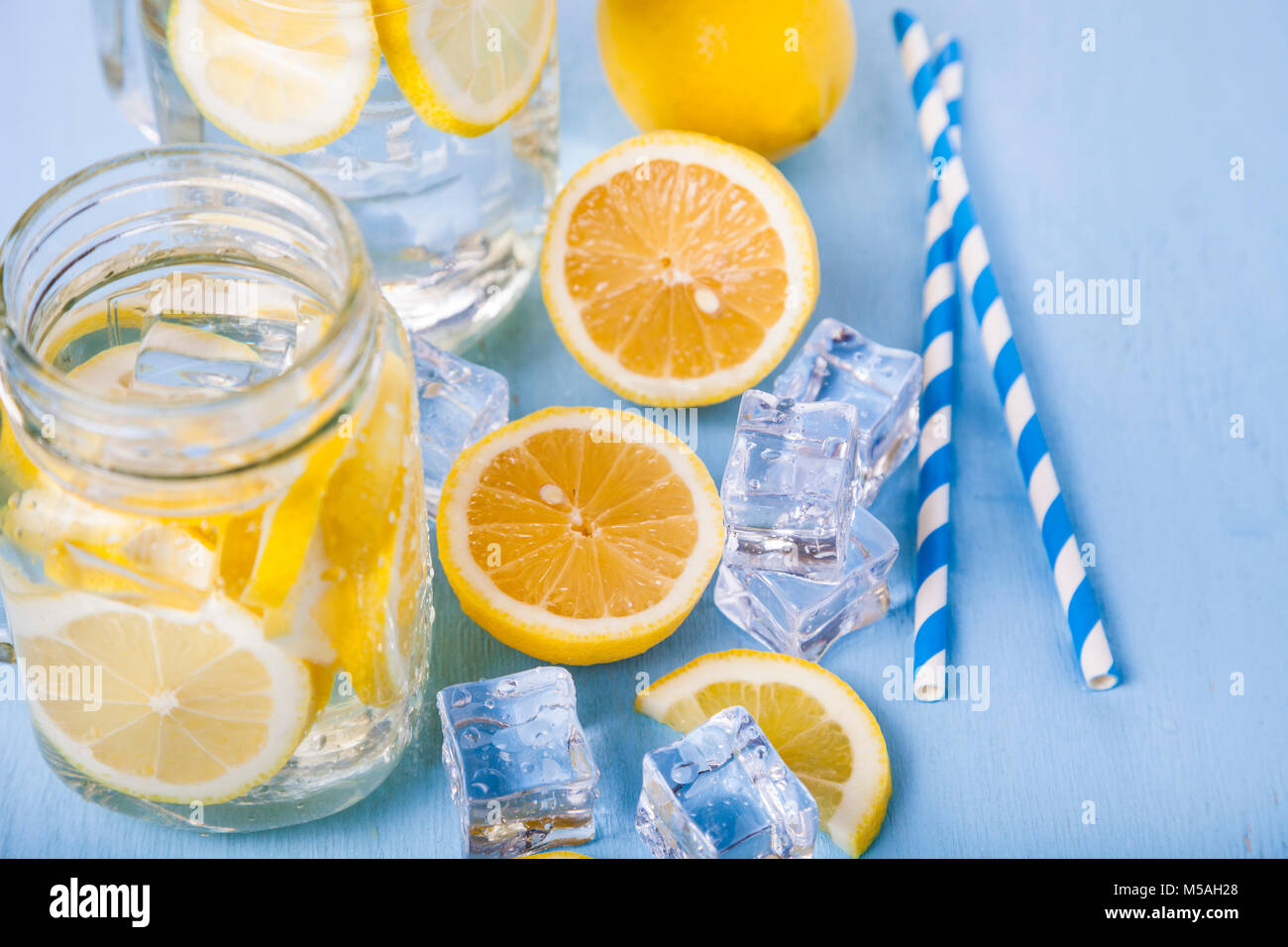 Refreshing ice cold water with lemon ready to drink. Concept of diet. Diet for weight loss Stock ...