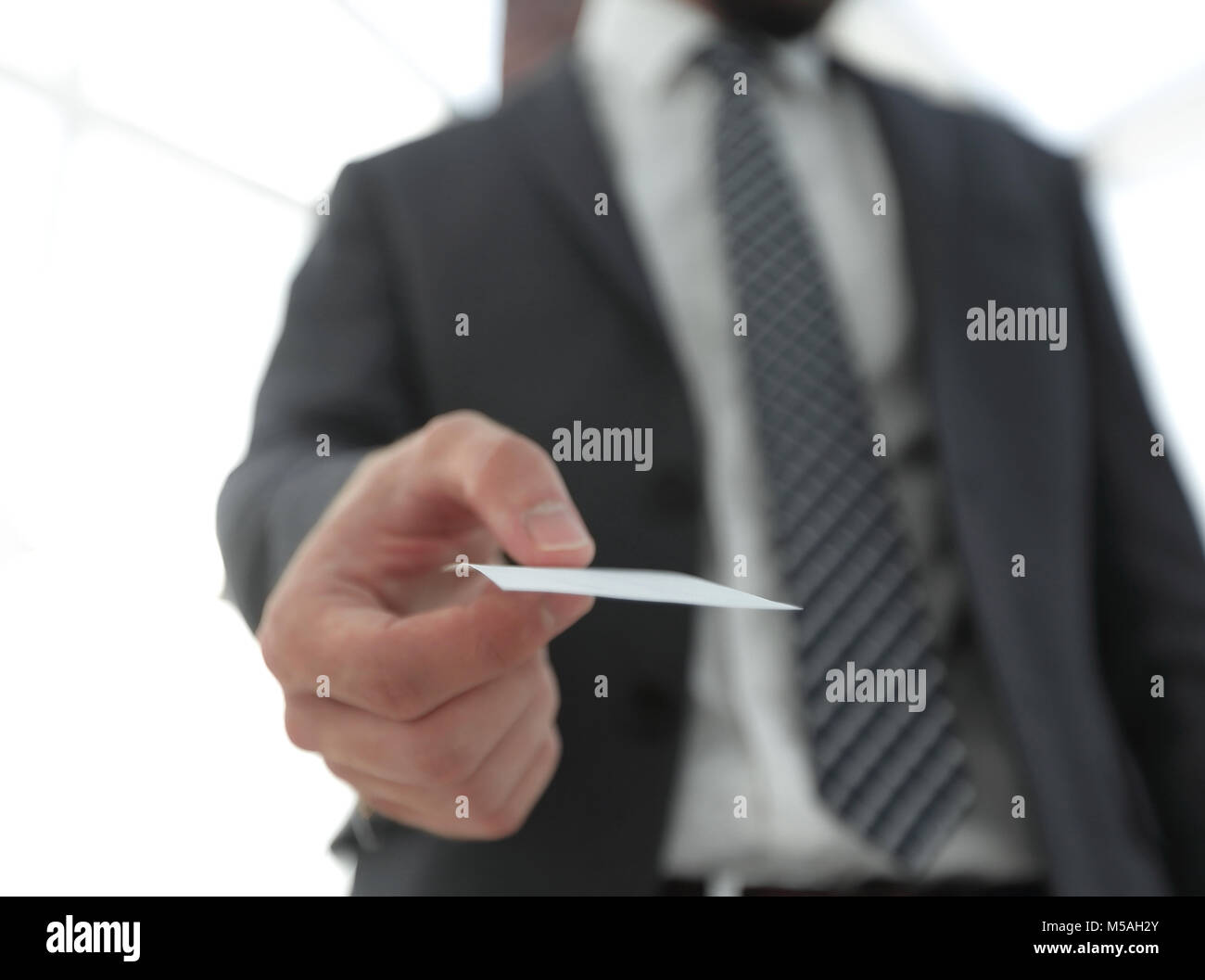 Business man giving business card on bright background Stock Photo - Alamy