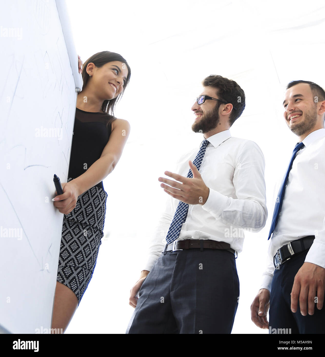 coach conducts training with business team Stock Photo - Alamy