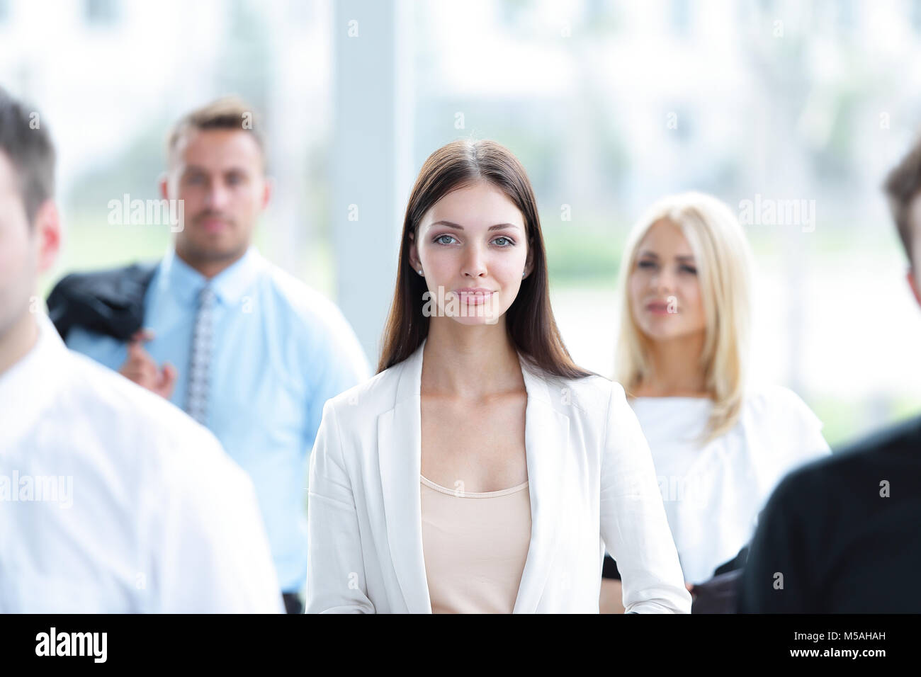 confident business woman among his colleagues Stock Photo - Alamy