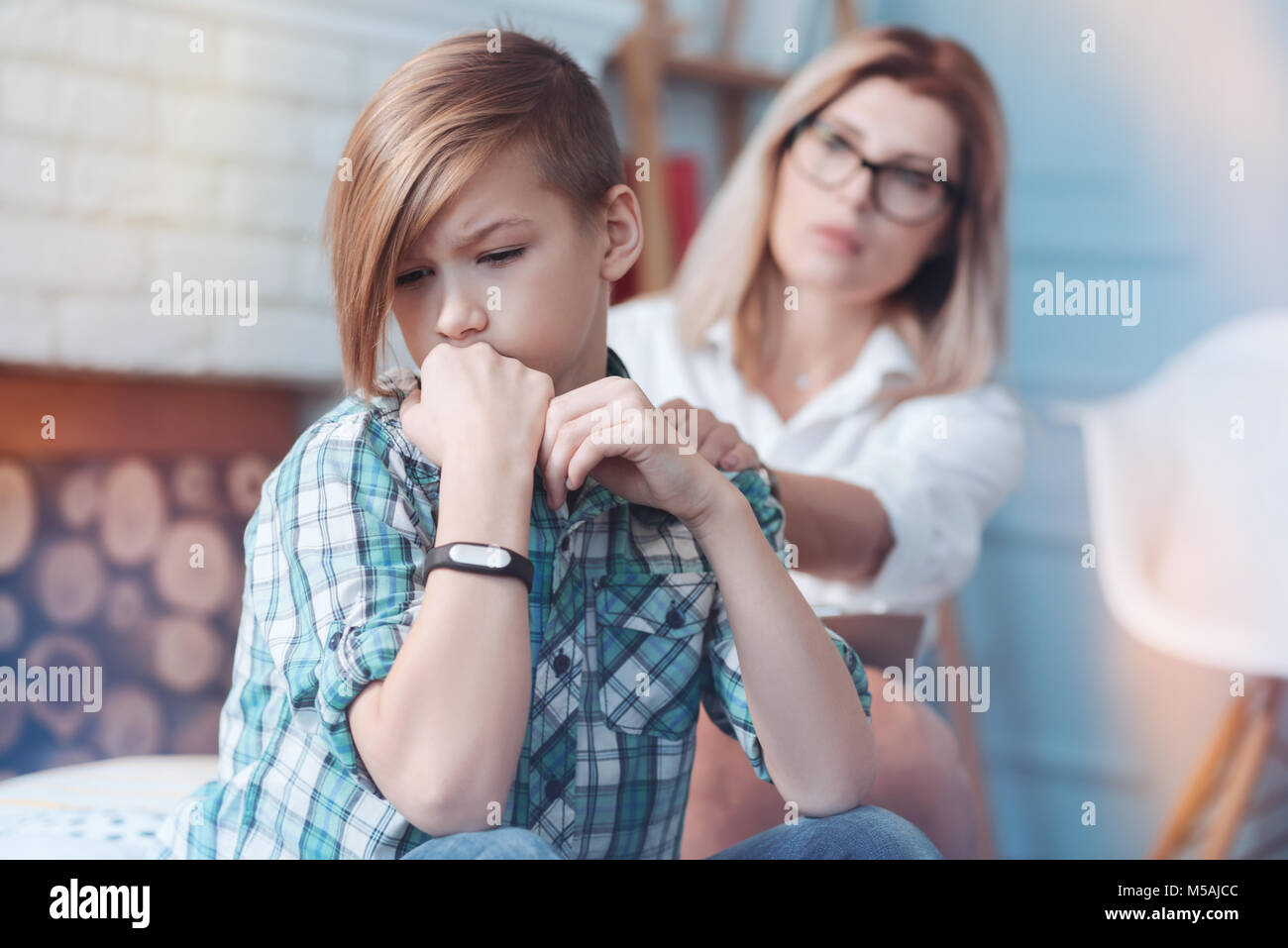 Neurotic teenage kid is not willing to answer uncomfortable questions ...