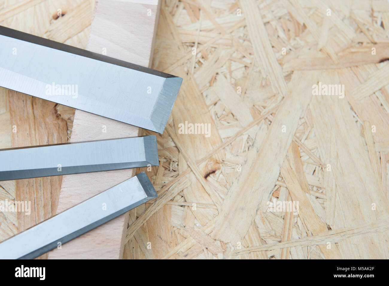 A professional chisel on a wooden background, with room for text Stock ...