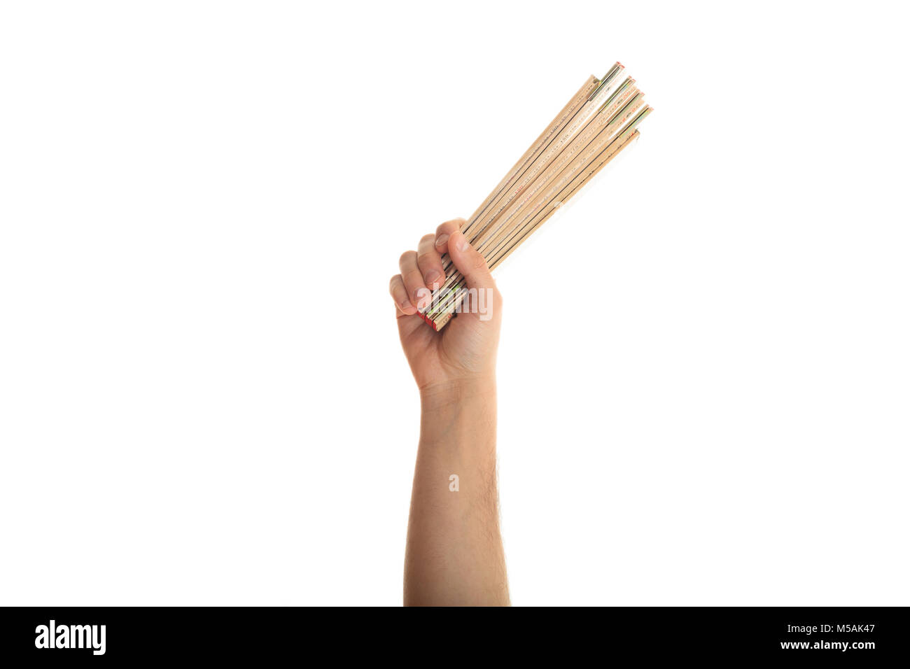 Hand holding a wooden foldable meter on white background Stock Photo ...