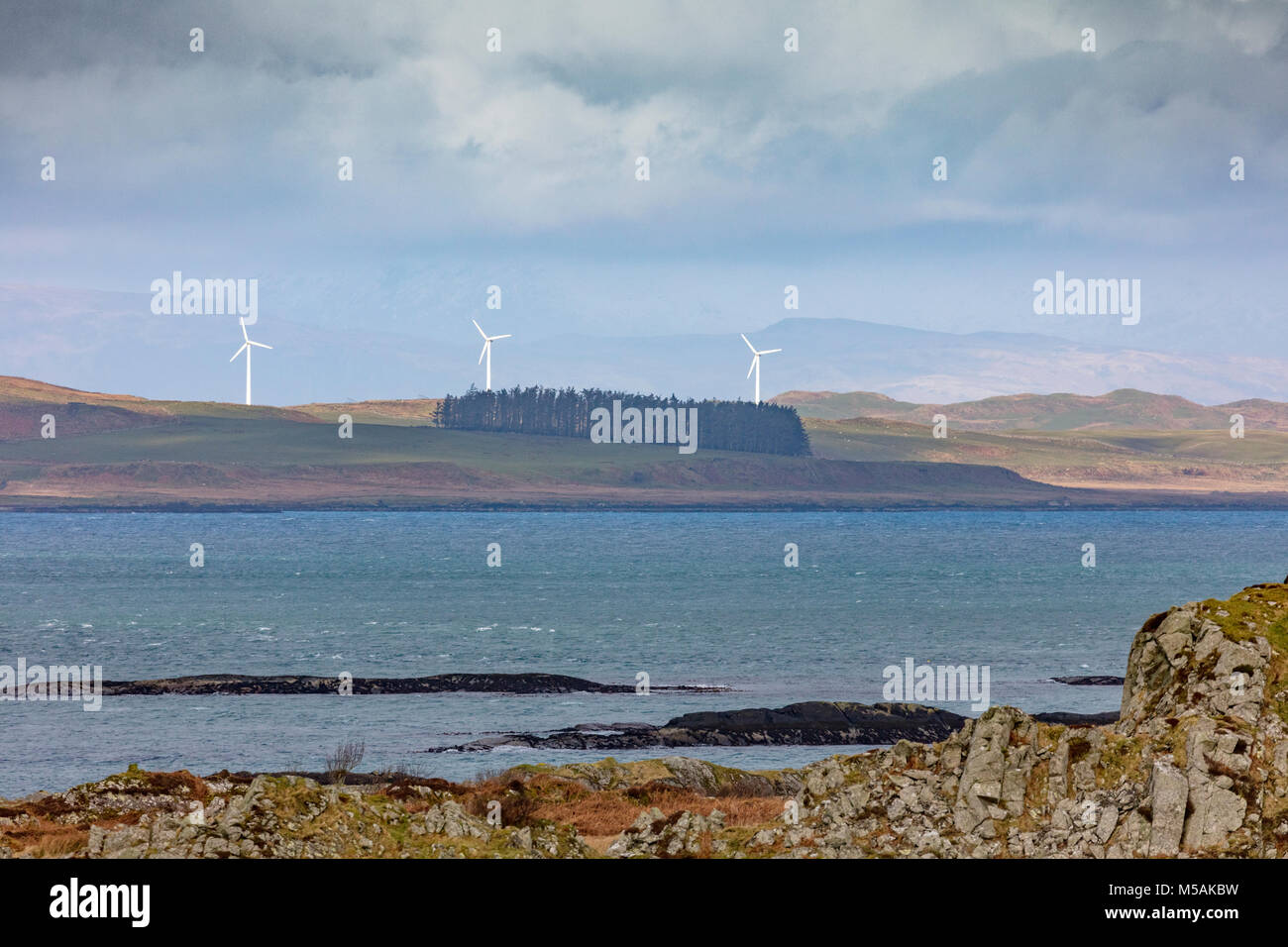 Wind farms, isle of Mull in background, Winter, Argyll and Bute ...