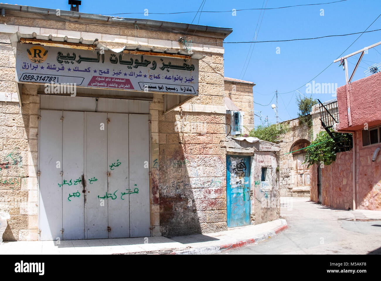 RAMALLAH, ISRAEL - AUGUST 07, 2010: horizontal picture of closed door store in Ramallah, capital ...
