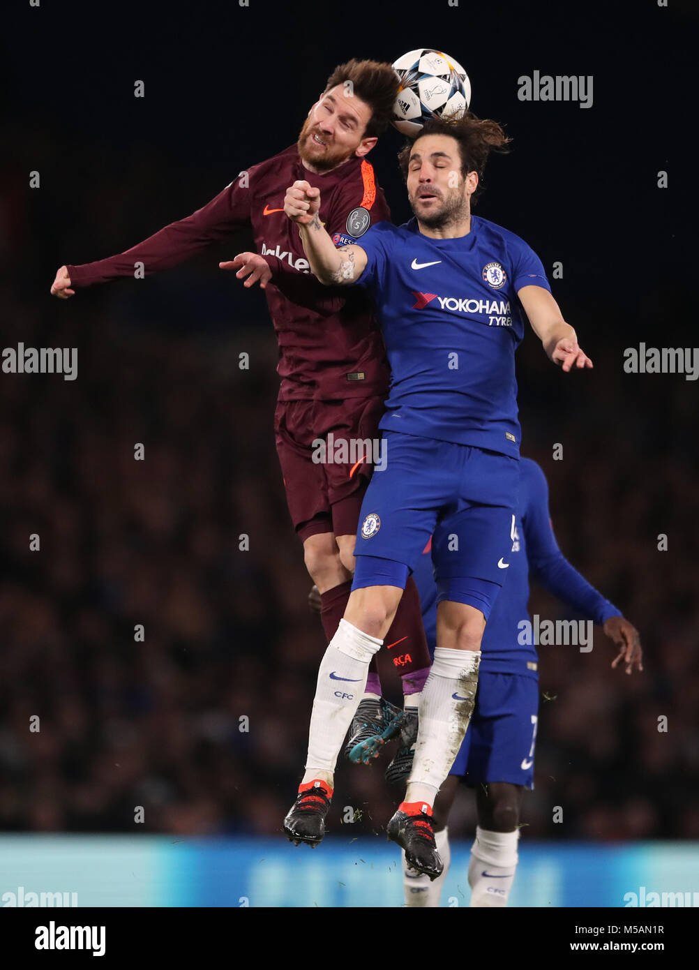 Chelsea's Cesc Fabregas (right) and Barcelona's Lionel Messi battle for ...