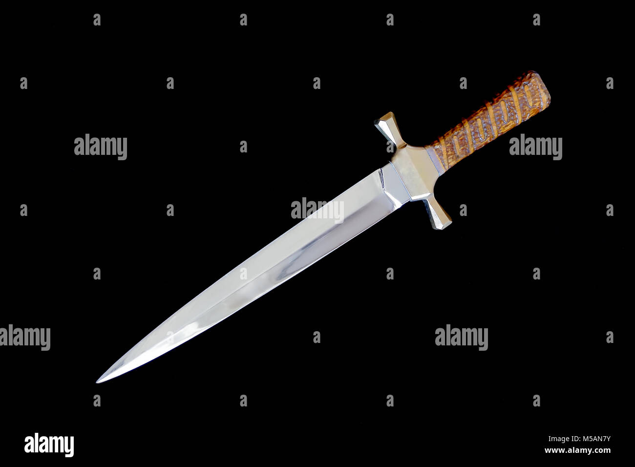 Image of cold weapon on black background Stock Photo - Alamy