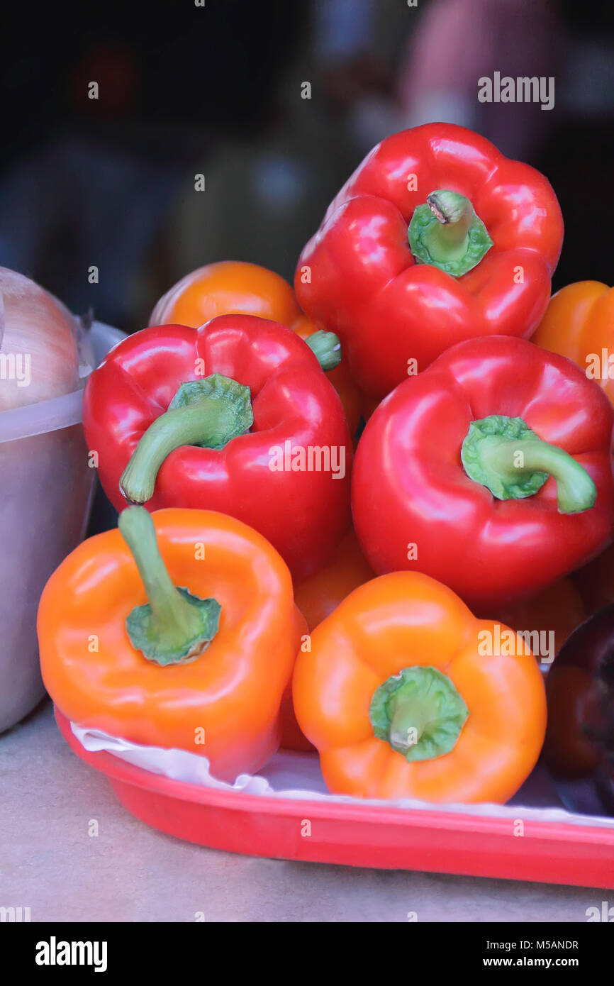 Image of red and yellow raw pepper Stock Photo - Alamy