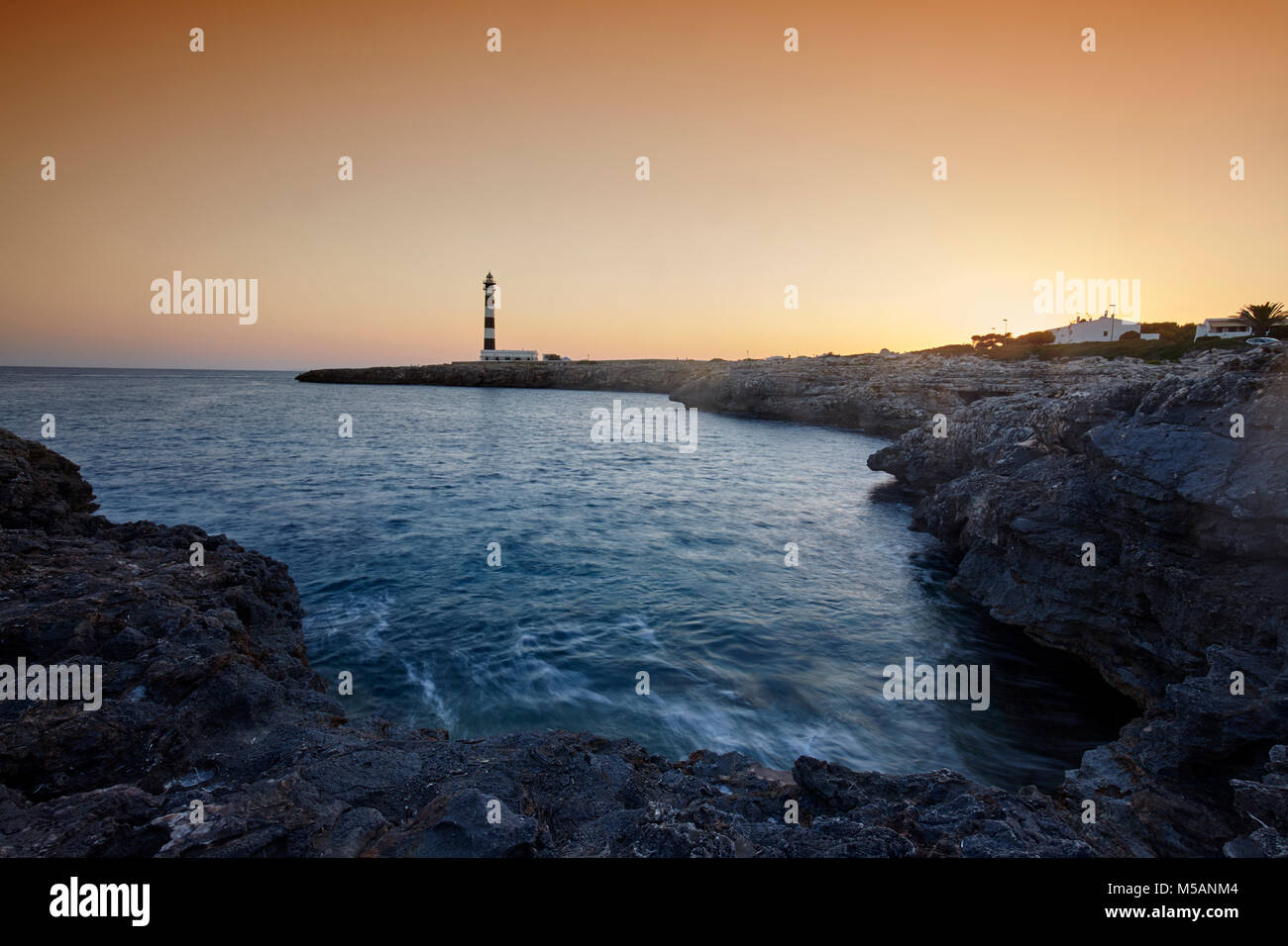 Cap d'Artrutx Lighthouse, located in the extreme south-western point of ...