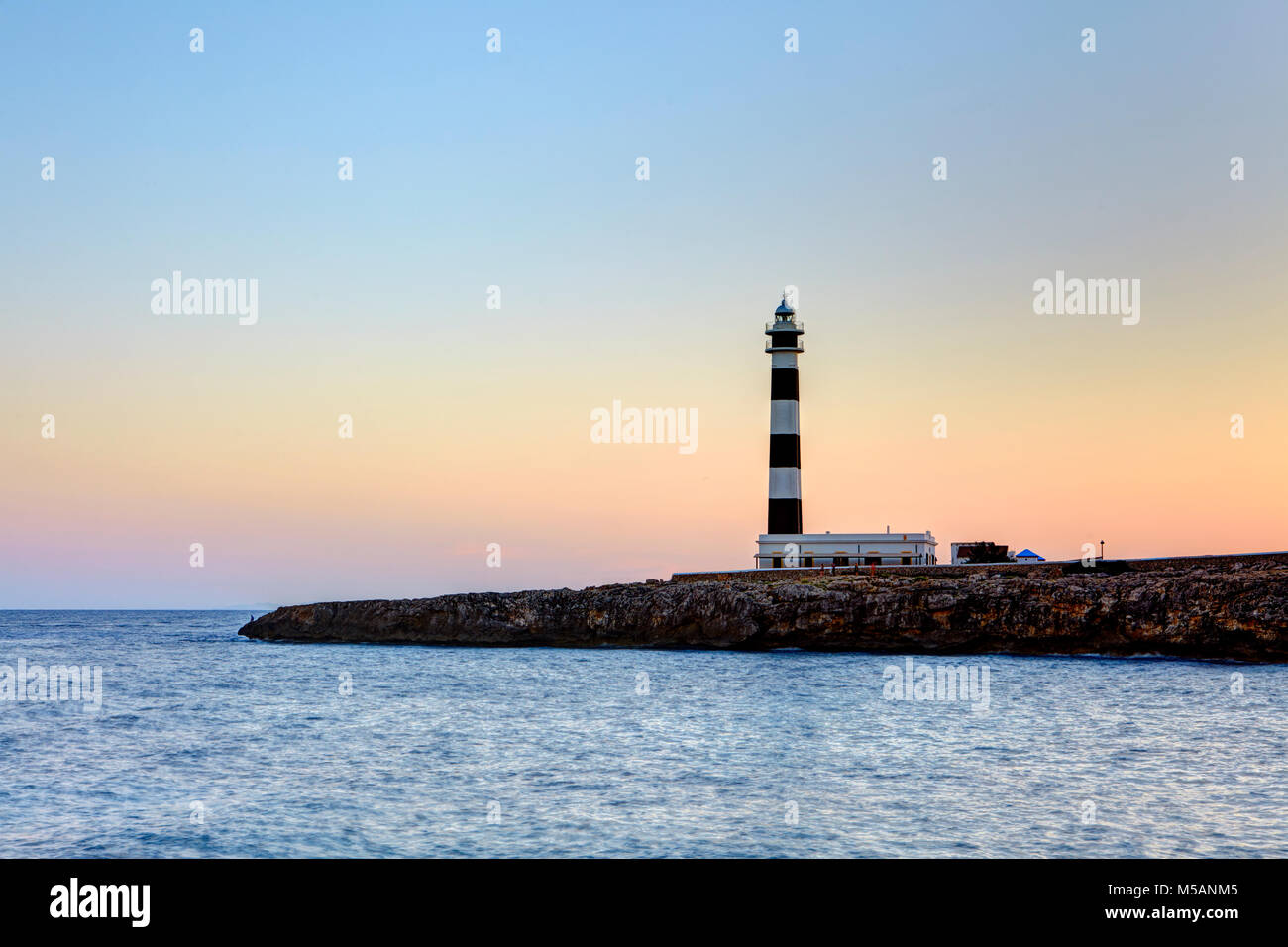 Cap d'Artrutx Lighthouse, located in the extreme south-western point of ...