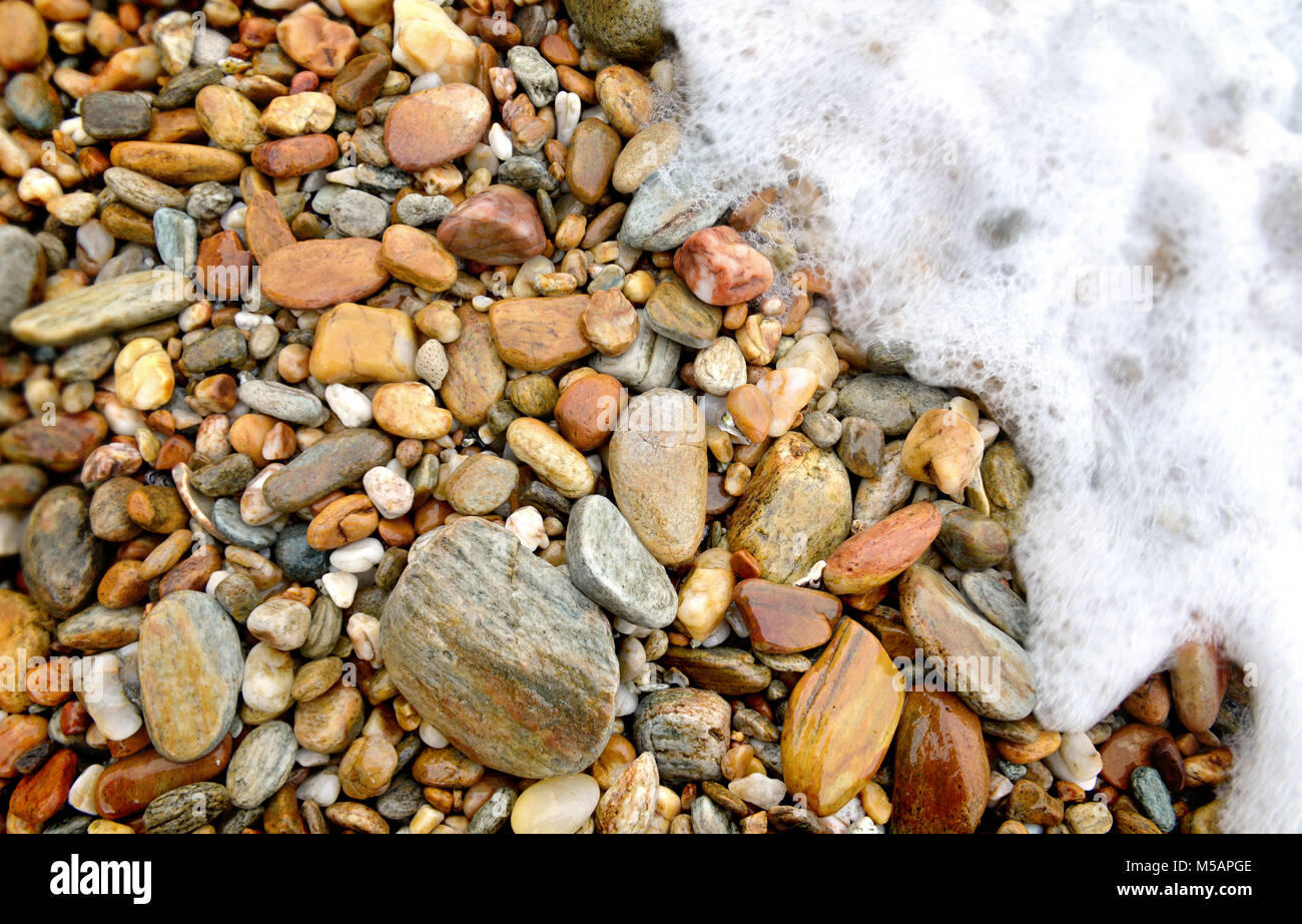 Mixed shape and colorful tropical beach natural ocean gravel and sand ...