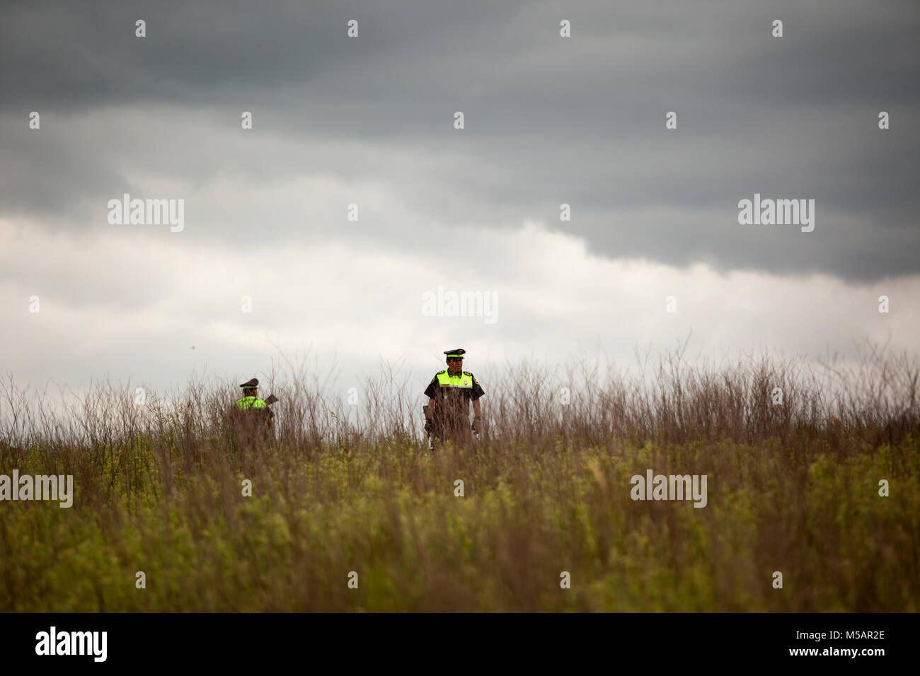 Police guard a small farm house that was used by Joaquin "El Chapo" Guzman to escape Altiplano ...
