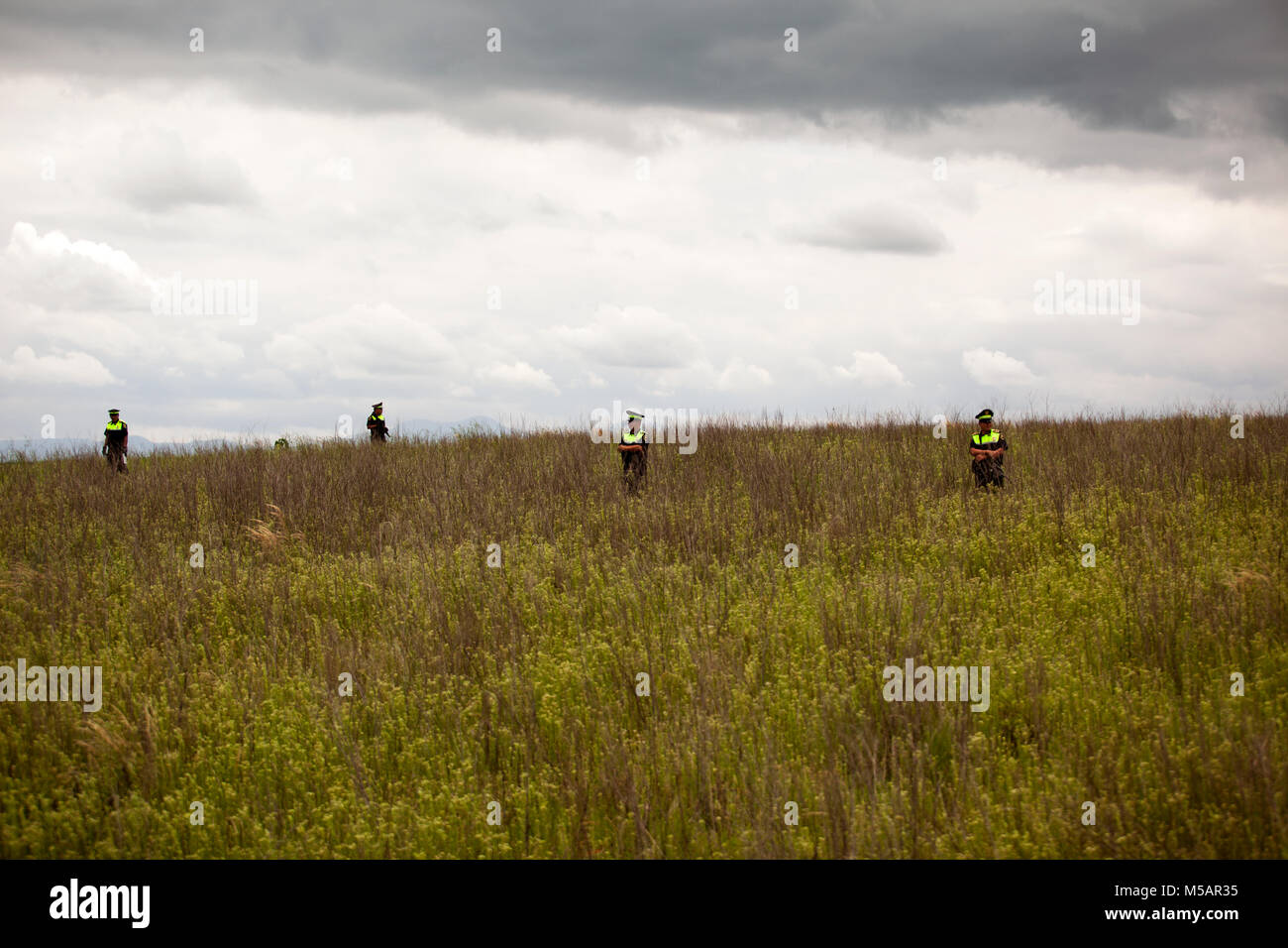 Police guard a small farm house that was used by Joaquin "El Chapo" Guzman to escape Altiplano ...