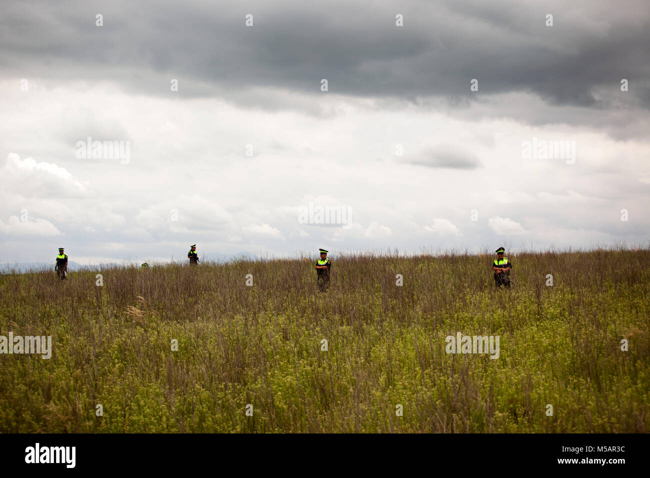 Police guard a small farm house that was used by Joaquin "El Chapo" Guzman to escape Altiplano ...