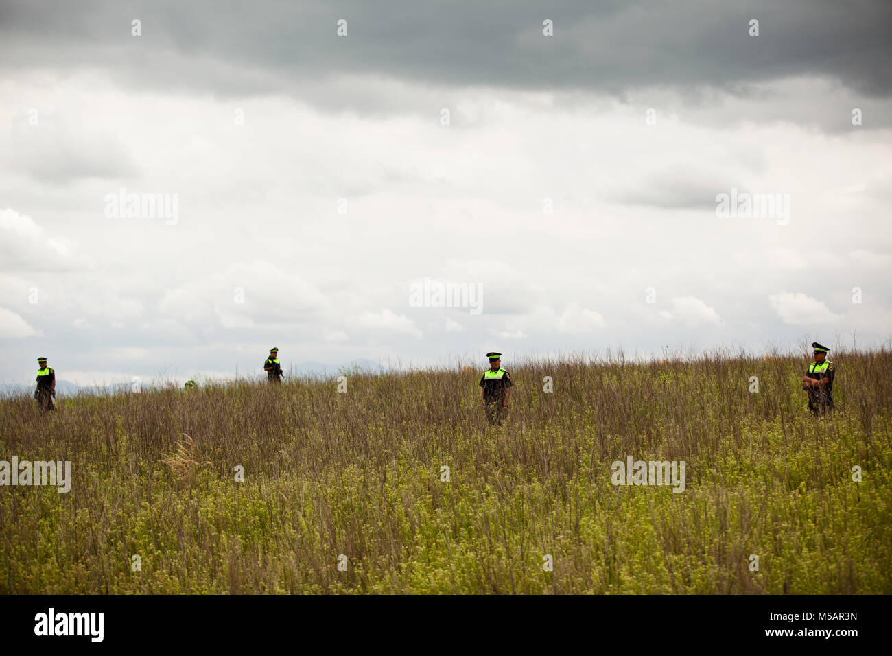 Police guard a small farm house that was used by Joaquin "El Chapo" Guzman to escape Altiplano ...