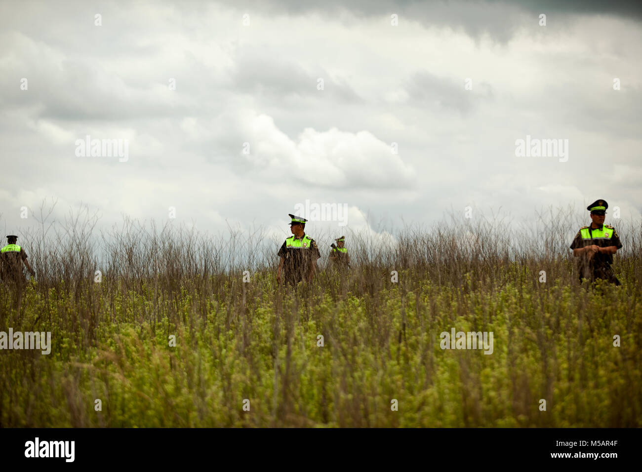 Police guard a small farm house that was used by Joaquin "El Chapo" Guzman to escape Altiplano ...