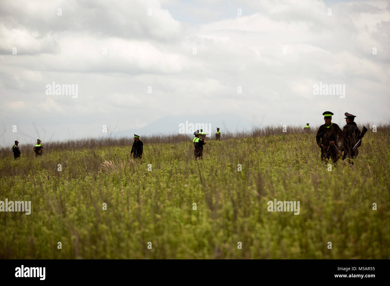 Police guard a small farm house that was used by Joaquin "El Chapo" Guzman to escape Altiplano ...