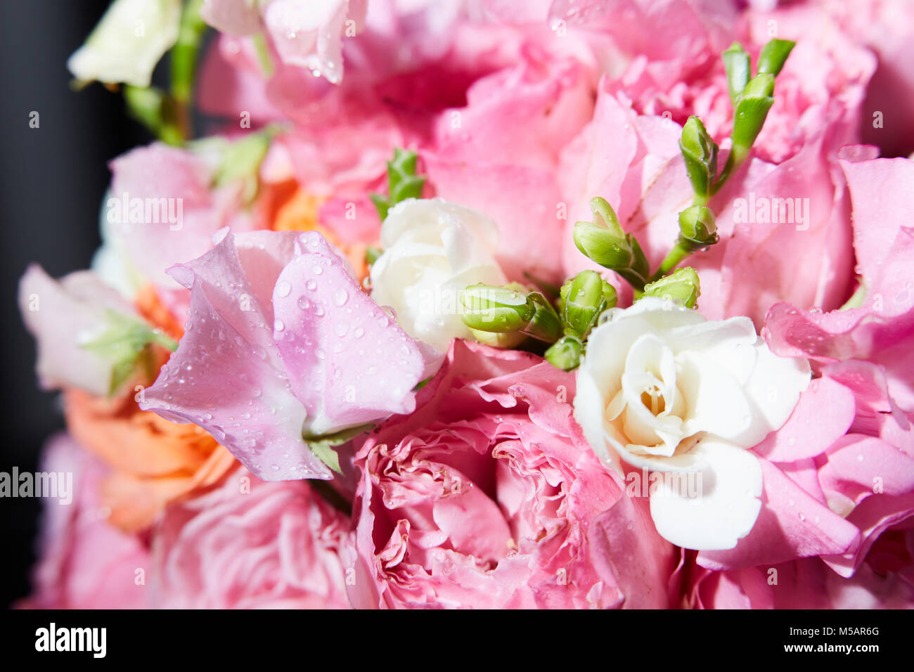 A Bucket of peony flowers with other different flowers close-up Stock ...