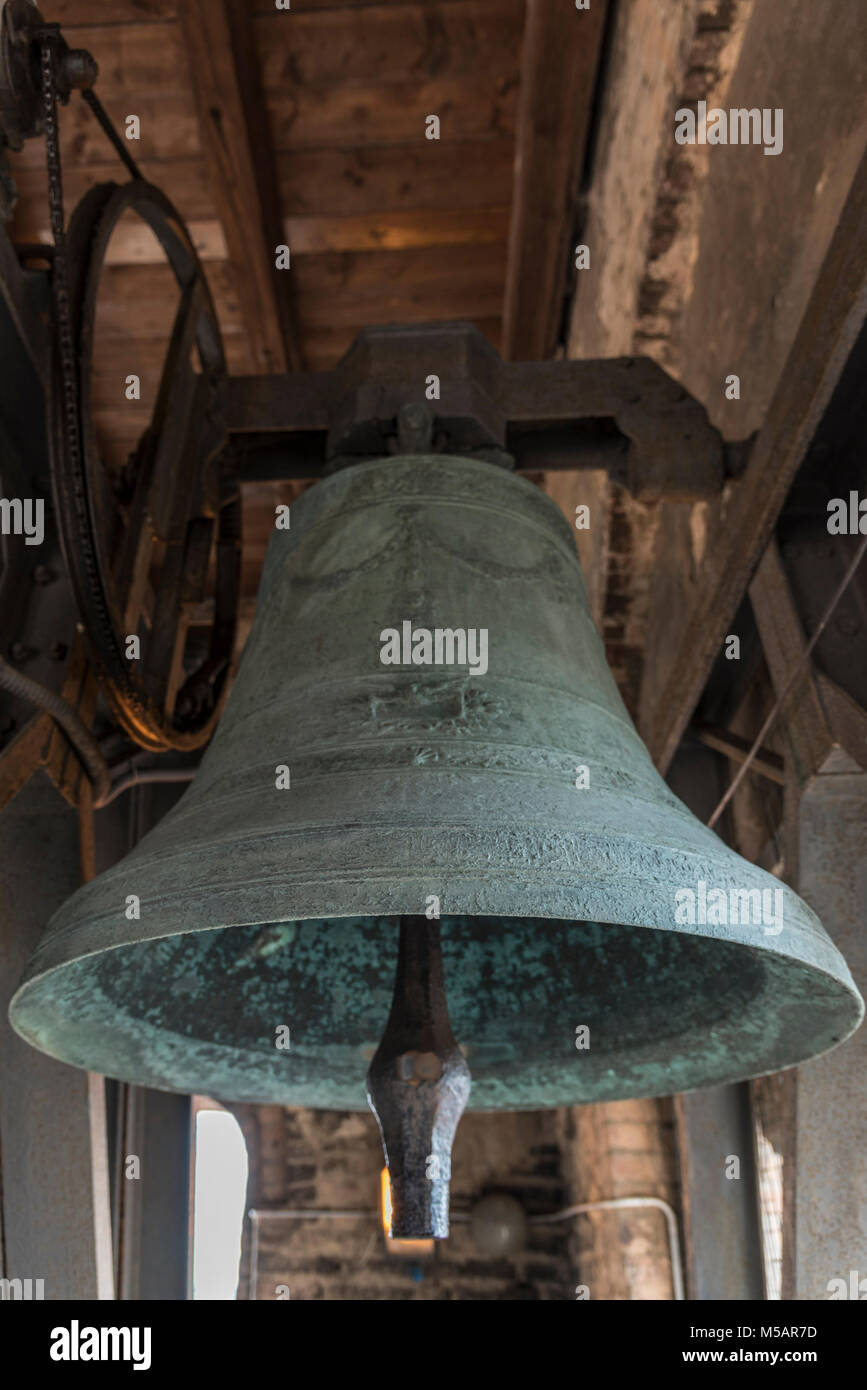 Ancient bell placed in an old catholic church Stock Photo - Alamy