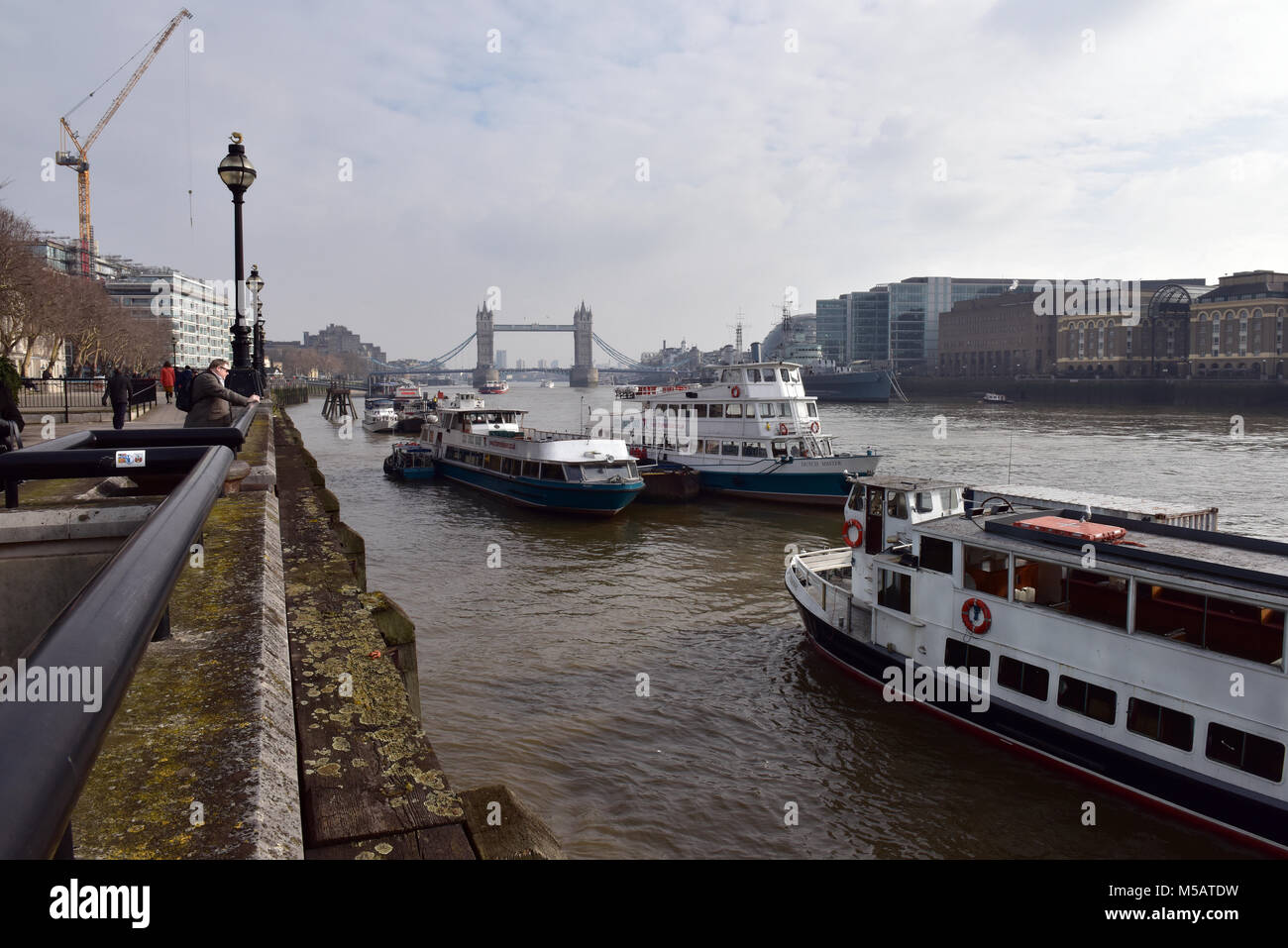 River boats and pleasure cruises on the thames in central london with ...