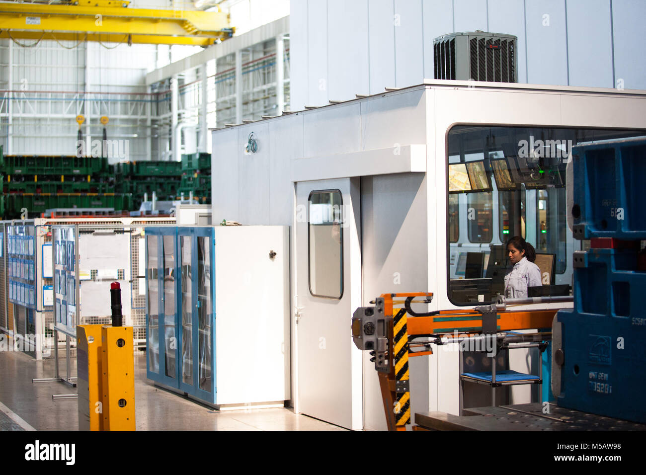 A worker in the golf vehicle section of the Volkswagen factory in ...