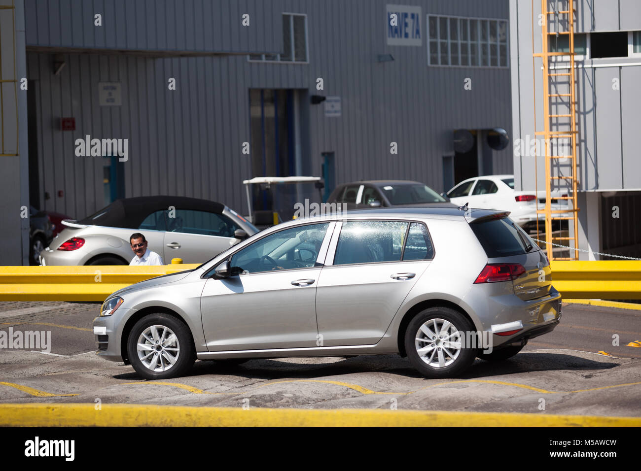 A vehicle goes through a final inspection before being shipped out of ...