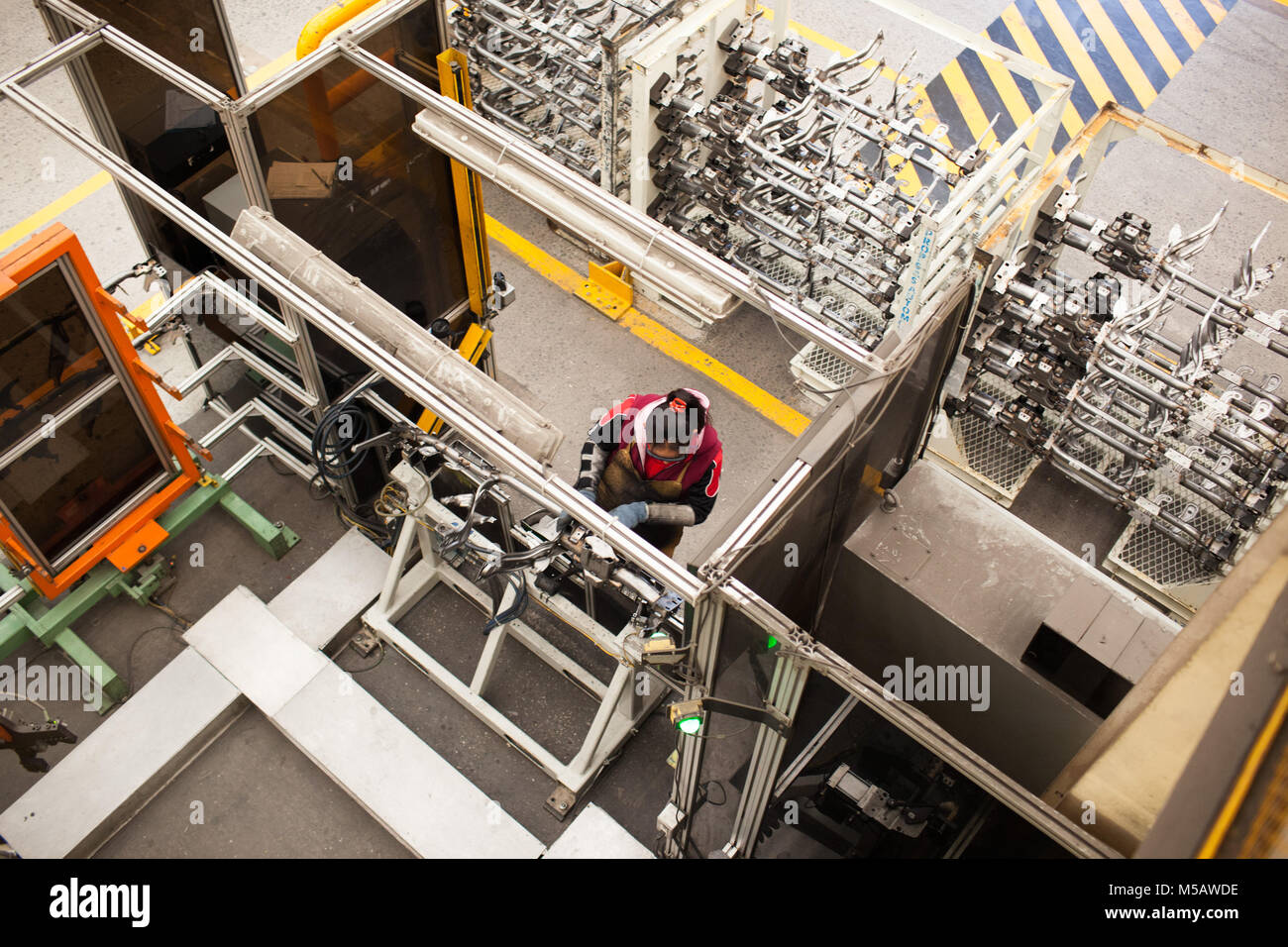 A worker at the Magna plant in Puebla, Mexico on Thursday, January 22 ...