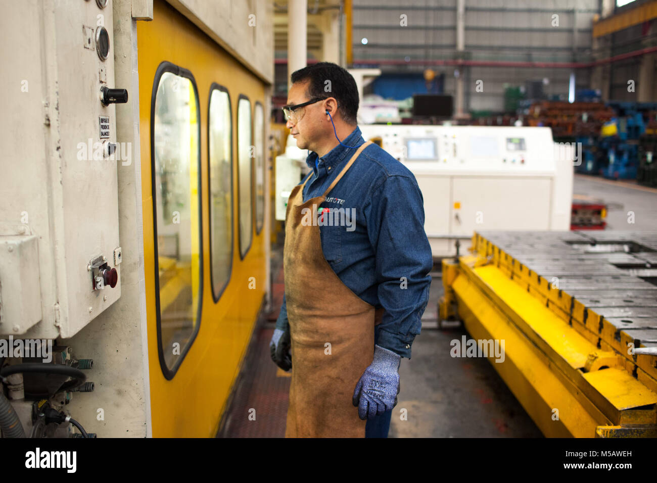 A worker at the Magna plant in Puebla, Mexico on Thursday, January 22 ...
