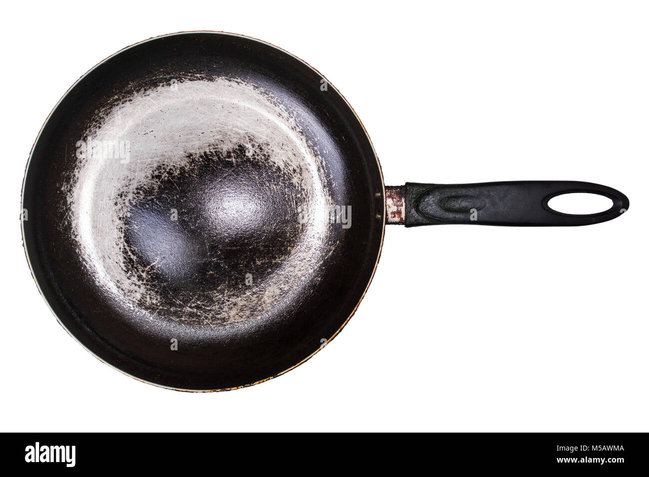 Scratched black old pan on white background Stock Photo - Alamy